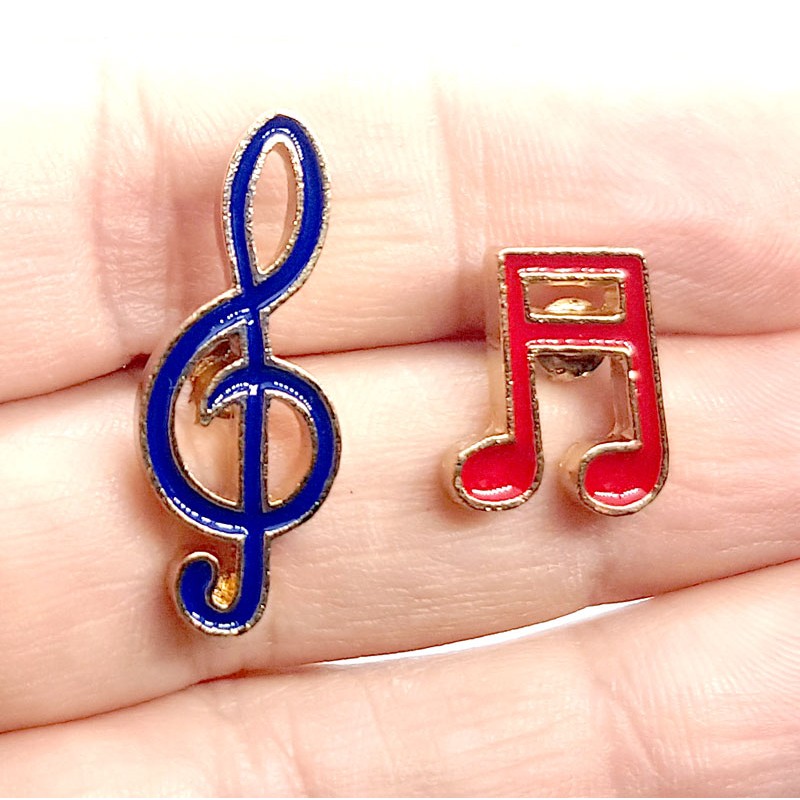 Mira qué bonitos pins en forma de CLAVE DE SOL y de SEMICORCHEAS