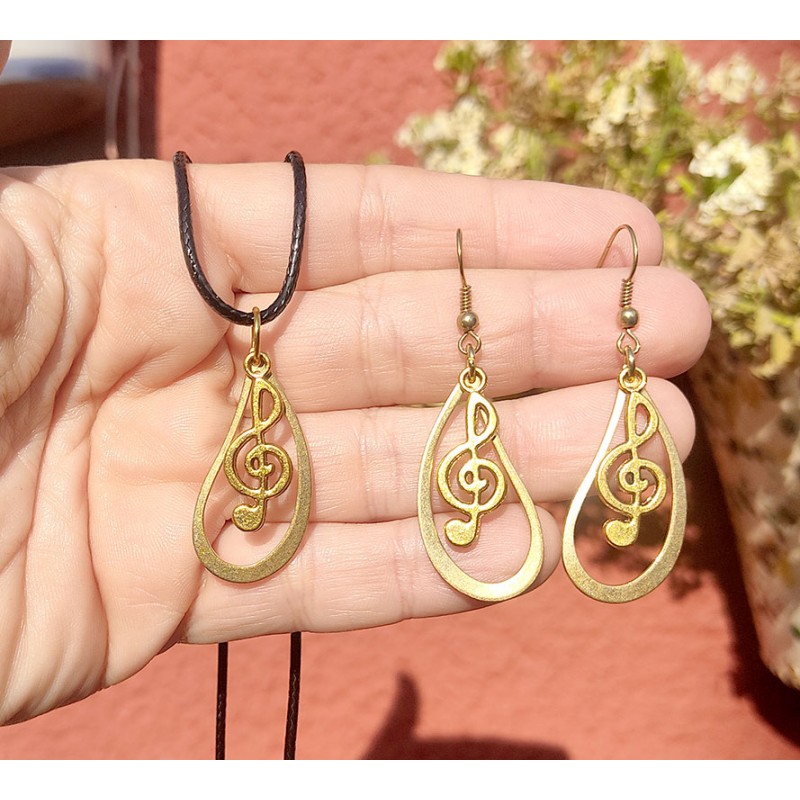 Precioso conjunto de clave de sol dorado